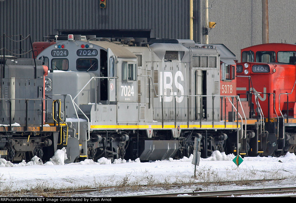 CN 7024 Leased to Standard General Contracting,.sitting in the idle line at Walker Yard